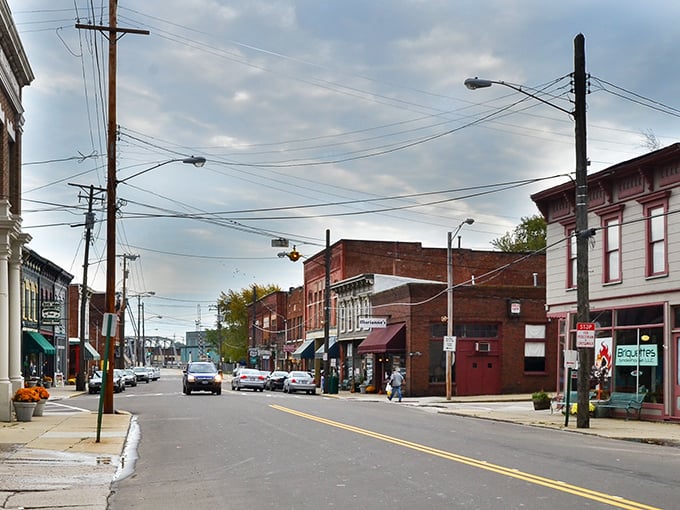 Bridge Street's colorful storefronts invite exploration, each doorway promising treasures from antiques to homemade fudge that would make your dentist nervously check their calendar.