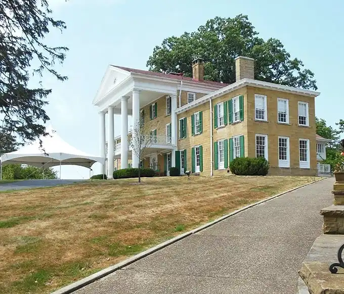The Bryn Du Mansion stands proudly on its hill, like someone who knows they're overdressed for the party but doesn't care.