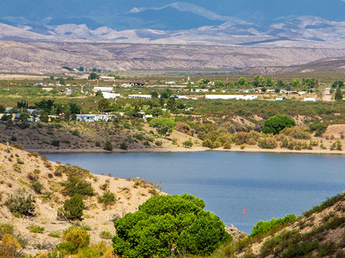 Desert meets water in this stunning contradiction – Caballo Lake's azure waters provide a refreshing counterpoint to the rugged mountain backdrop.