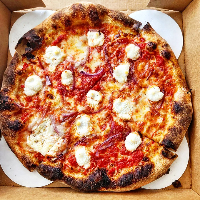 The holy grail for pizza purists. Thin, crispy crust cut into squares—this is how Chicagoans actually eat pizza when tourists aren't looking.