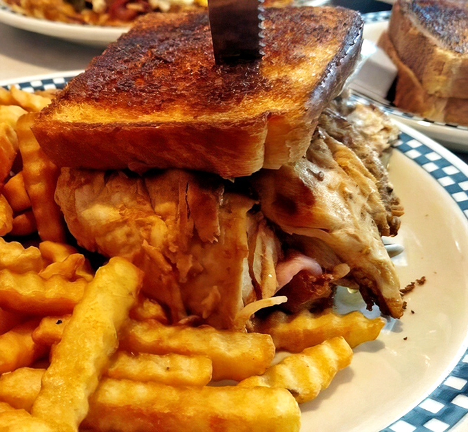 This isn't just a sandwich – it's an engineering marvel of perfectly toasted bread and tender meat that would make Elvis himself do a double-take.