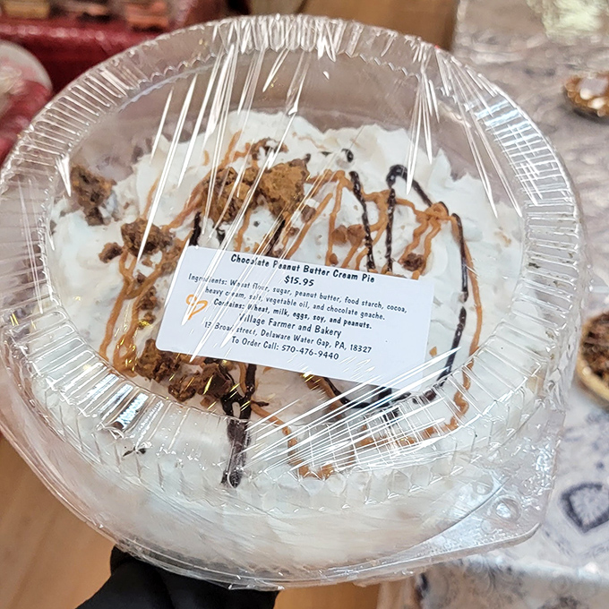 The Chocolate Peanut Butter Cream Pie doesn't just satisfy cravings—it creates lifelong devotees. That drizzle of peanut butter sauce is pure showmanship.