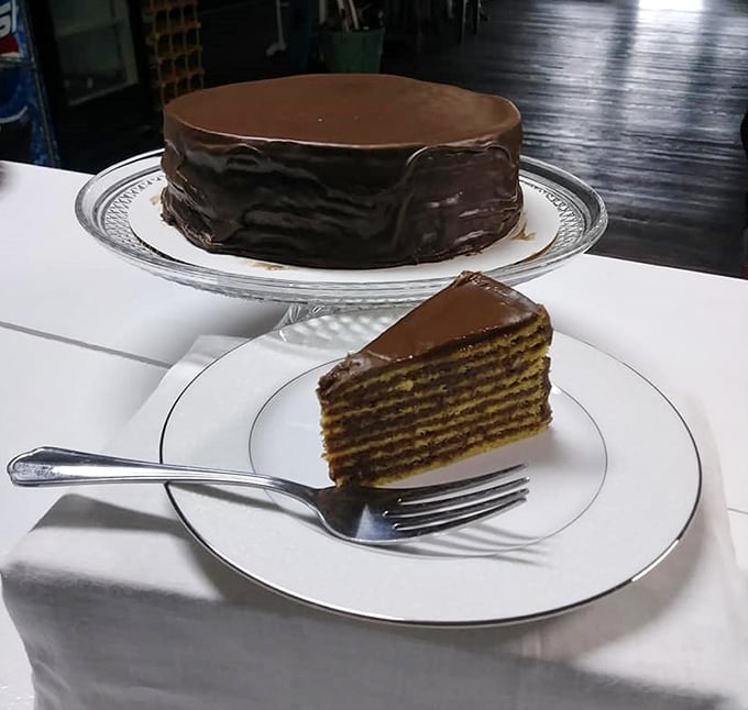 Layer upon thin layer of yellow cake embraced by chocolate frosting – the classic Smith Island Cake reveals its architectural splendor when sliced.