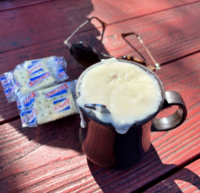 Clam chowder that demands respect – creamy, hearty, and served with those little packets of crackers that somehow taste better than they do anywhere else.