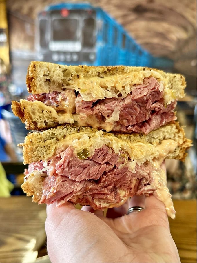 The star of the show in all its glory. This isn't just a sandwich—it's corned beef architecture that would make Frank Lloyd Wright jealous.