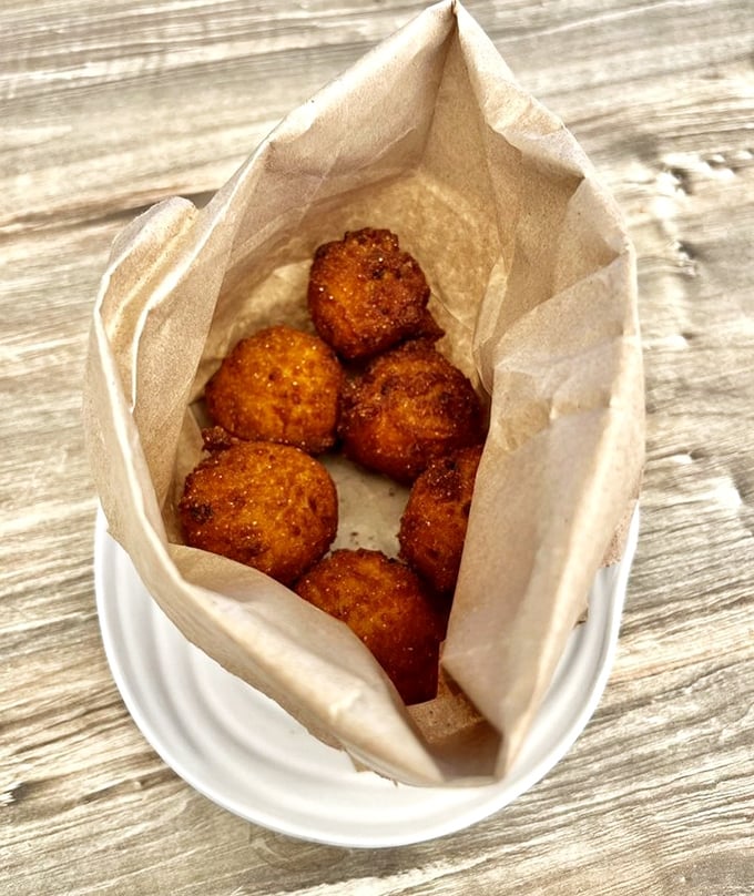 Golden orbs of cornmeal perfection that should be illegal in at least seven states. These hush puppies don't just speak—they sing.