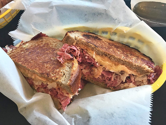 This isn't just a sandwich; it's corned beef poetry on rye – thinly sliced, perfectly stacked, and destined to haunt your food dreams for weeks.