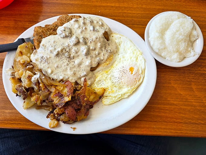 Country fried steak nirvana—crispy exterior, tender meat, and gravy that could make a vegetarian question their life choices.