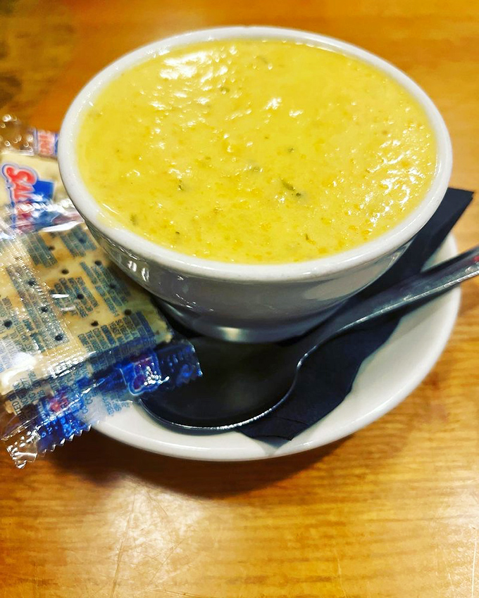 The legendary crab bisque arrives like liquid gold in a bowl—creamy, rich, and packed with enough crab to make you question why you'd ever order anything else.
