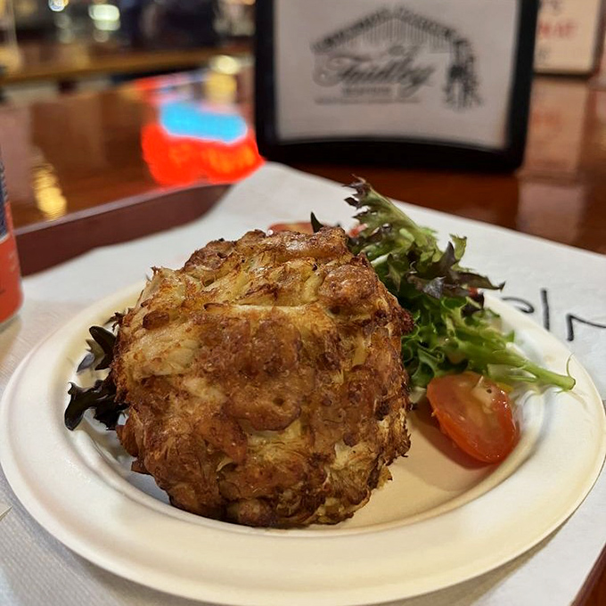 Behold the legendary Faidley's crab cake – a golden-brown masterpiece that's more crab than cake. This is what seafood dreams are made of.