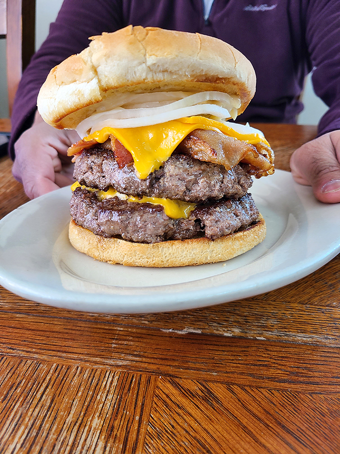 Behold the double cheeseburger in all its glory—a towering testament to the fact that sometimes more is exactly the right amount.
