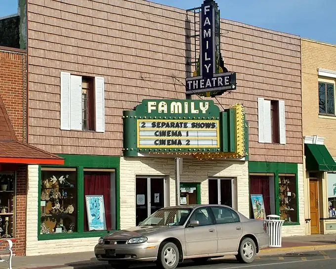The Family Theatre marquee promises entertainment the old-fashioned way. No algorithms here—just movies selected by humans for humans.
