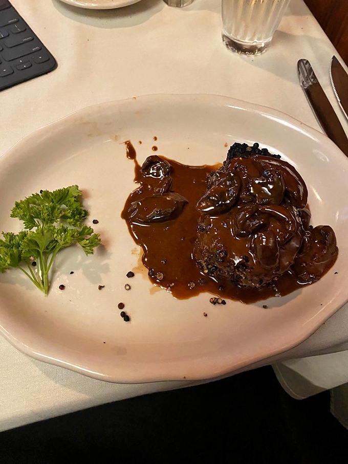 Behold the filet that launched a thousand road trips—perfectly pink and unapologetically generous.