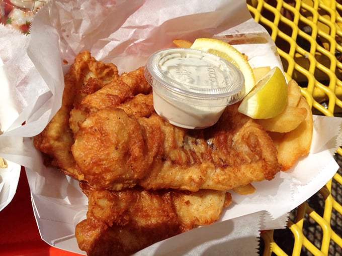 Golden-battered fish that shatters with each bite, served with crispy fries and house-made tartar sauce – seafood nirvana achieved.