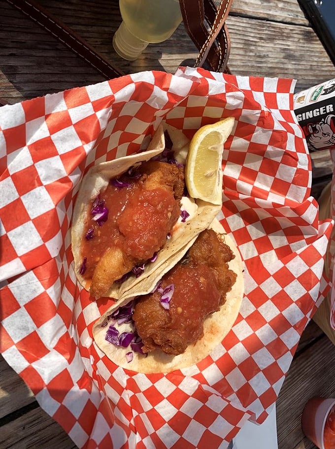 These fish tacos aren't trying to win beauty contests—they're too busy delivering crispy, tender perfection wrapped in simple tortillas with just the right toppings.