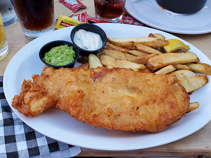 Golden-battered fish with chips thick enough to stand up and salute – this isn't fast food, it's a slow, savory romance on a plate.