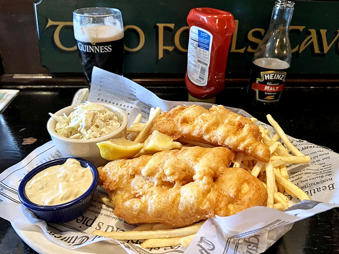 Golden-battered fish and chips served with a perfect Guinness—a combination that's brought more joy to humanity than most Nobel Prize winners.
