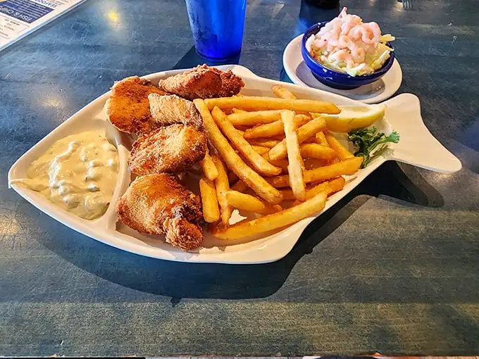 Fish-shaped plates aren't just cute—they're prophetic. This golden-battered cod with perfectly crisp fries might just be your new coastal obsession.