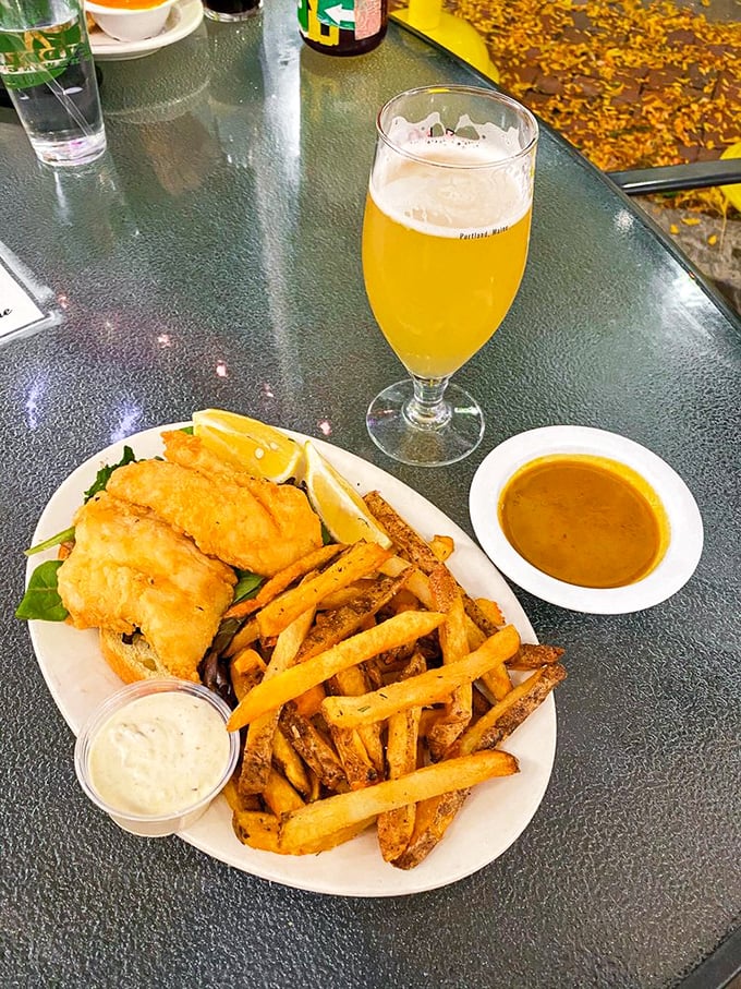 Golden-battered fish that shatters like glass, hand-cut fries with personality, and a beer the color of liquid sunshine. This is happiness on a plate.