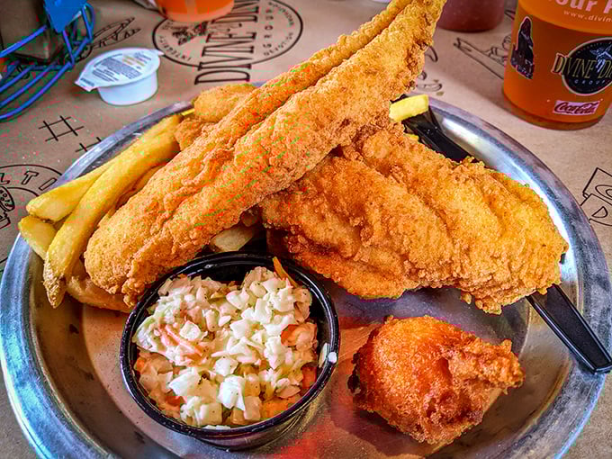 Golden-fried flounder that shatters like glass when your fork hits it, paired with crispy fries and creamy slaw—the holy trinity of coastal comfort.