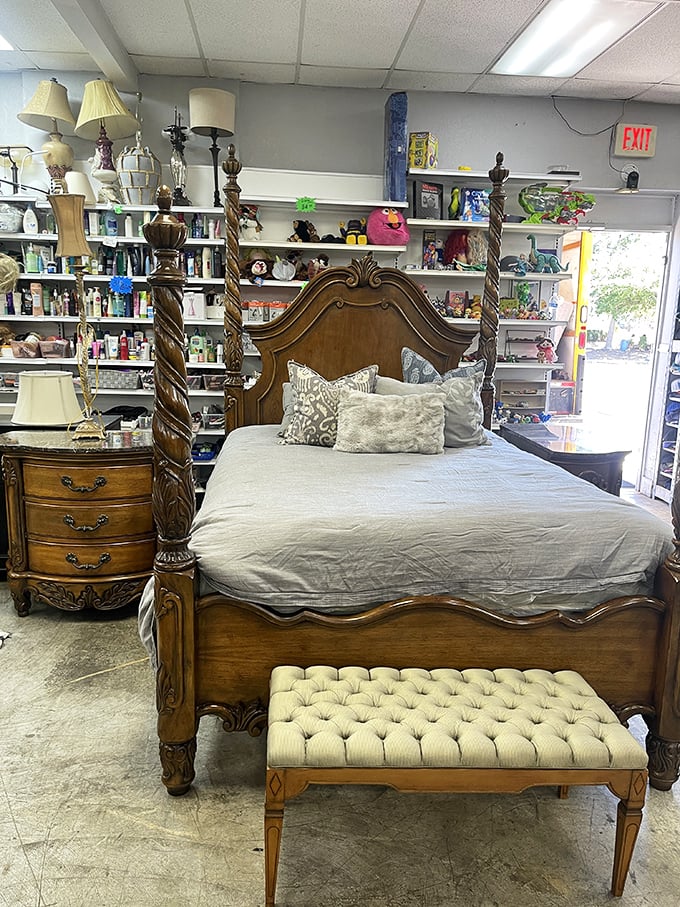 This four-poster bed isn't just sleeping quarters—it's practically royalty in wood form. The matching bench completes your bedroom's glow-up.