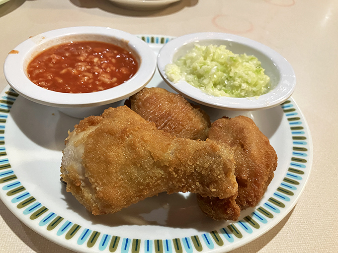 Golden-brown perfection that makes you forget your table manners. This chicken doesn't need fancy plating—it's the Meryl Streep of fried poultry, consistently excellent.