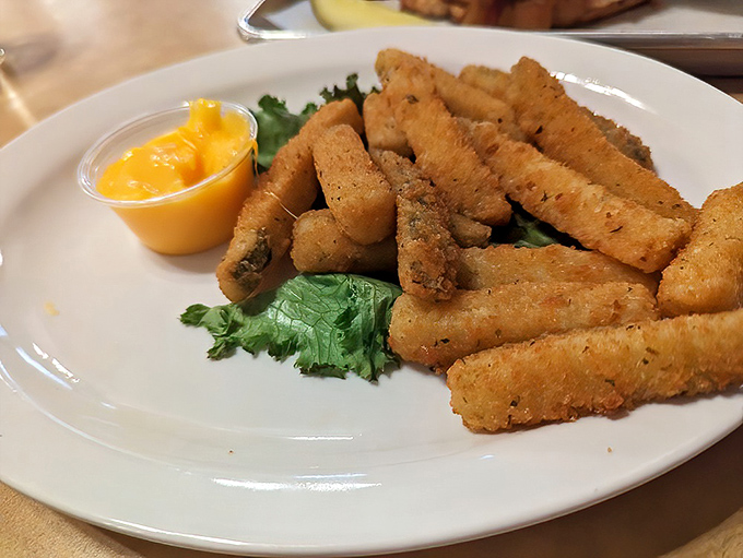 Golden-brown zucchini sticks that shatter with each bite—proof that vegetables can be vacation food too.