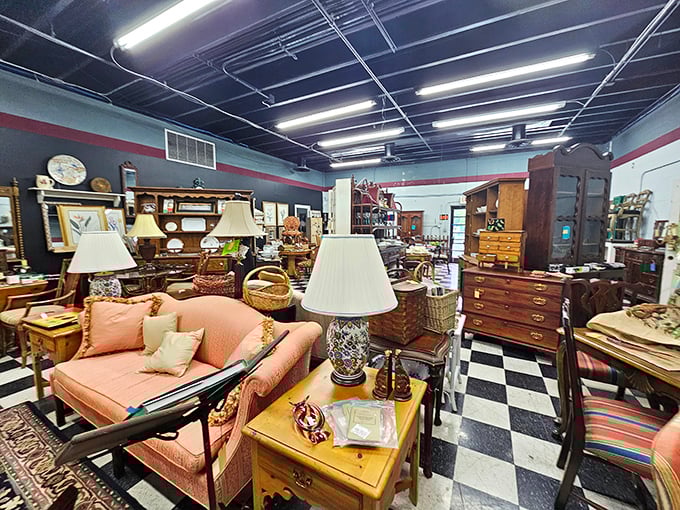 A living room frozen in time awaits its next family. That salmon-colored sofa has probably heard more stories than your favorite bartender.