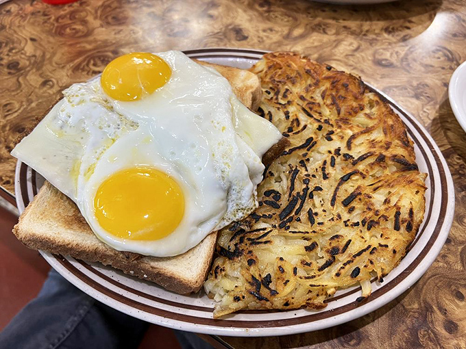 The hash brown holy grail—crispy exterior, tender interior. Like a potato that went to finishing school and graduated with honors.