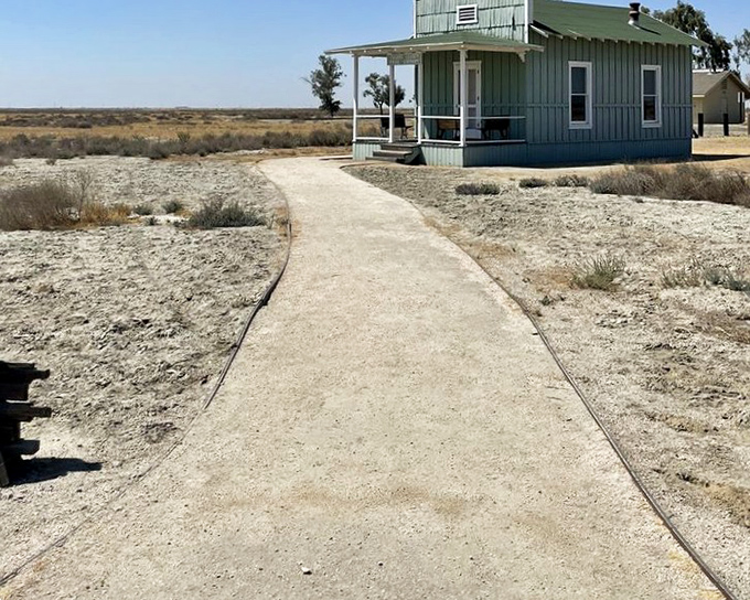A simple path leads to a modest building with an immodest history, where dreams of equality took physical form in the California dust.