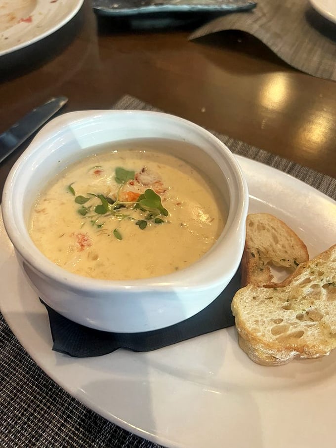 This lobster bisque isn't just soup—it's a creamy ocean hug in a bowl, with crusty bread standing by for the inevitable dip.