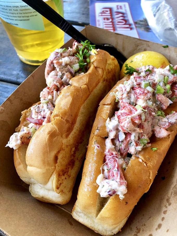 These lobster rolls aren't just sandwiches—they're edible love letters from the Atlantic. Chunky, sweet meat barely contained by buttery, toasted perfection.