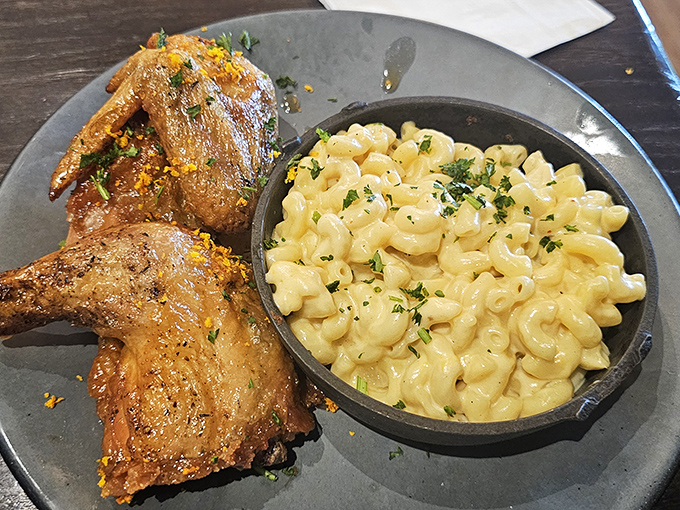 That mac and cheese isn't just a side dish—it's the co-star of the show, sharing the spotlight with perfectly roasted chicken.