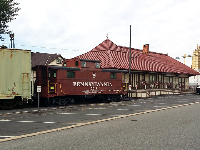 All aboard for a journey through time! The restored Pennsylvania Railroad caboose and station offer a glimpse into Manheim's transportation history.