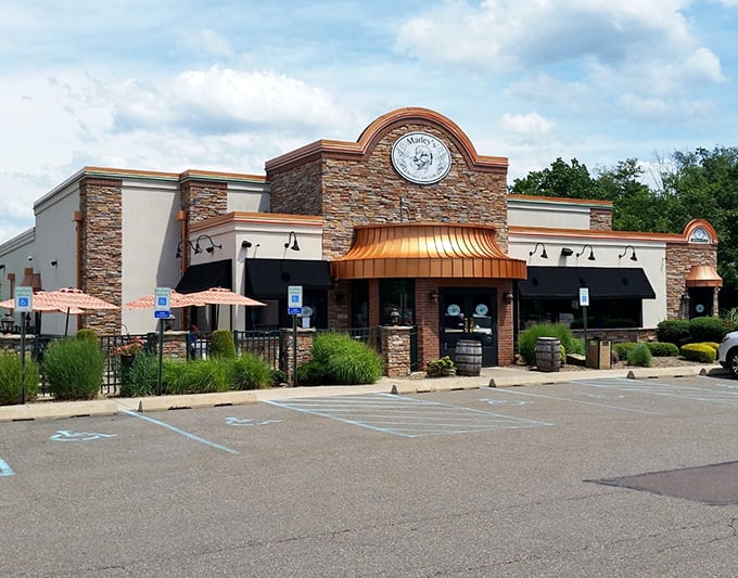 Marley's stone facade and copper awning aren't just Instagram-worthy—they're the gateway to craft brews that would make Bob himself say "everything's gonna be alright." 