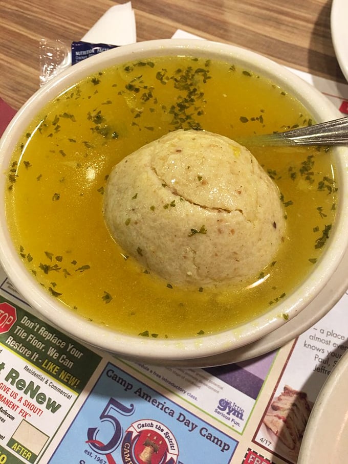 Behold the matzo ball soup—a golden elixir with a fluffy dumpling that would make any Jewish grandmother nod in approval.