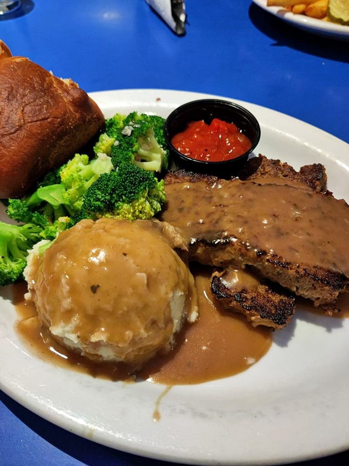 Meatloaf that doesn't just remind you of home—it makes you question why you ever left. That gravy river deserves its own zip code.