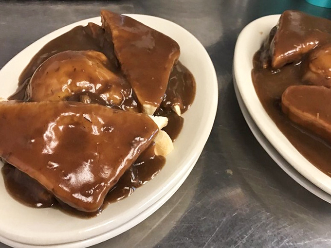 Meatloaf swimming in rich, glossy gravy – this isn't your standard diner fare, it's the dish that launches pilgrimages across Michigan.