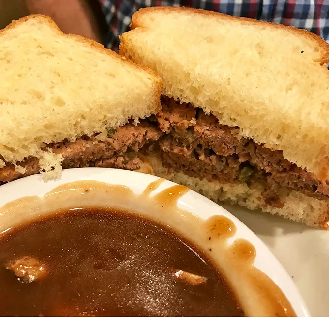 The legendary meatloaf sandwich – where comfort food gets a PhD. That gravy could make cardboard taste like a culinary revelation. 