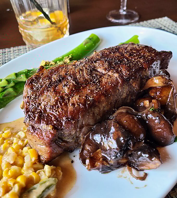 This isn't just a steak—it's a life event with mushrooms. The perfect sear gives way to a tender interior that makes other meat weep with jealousy.
