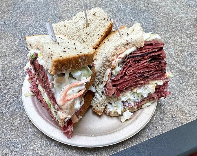 Behold the architectural marvel that is an Attman's sandwich—layers of hand-sliced meat stacked with the precision of a Jenga master and twice the satisfaction.