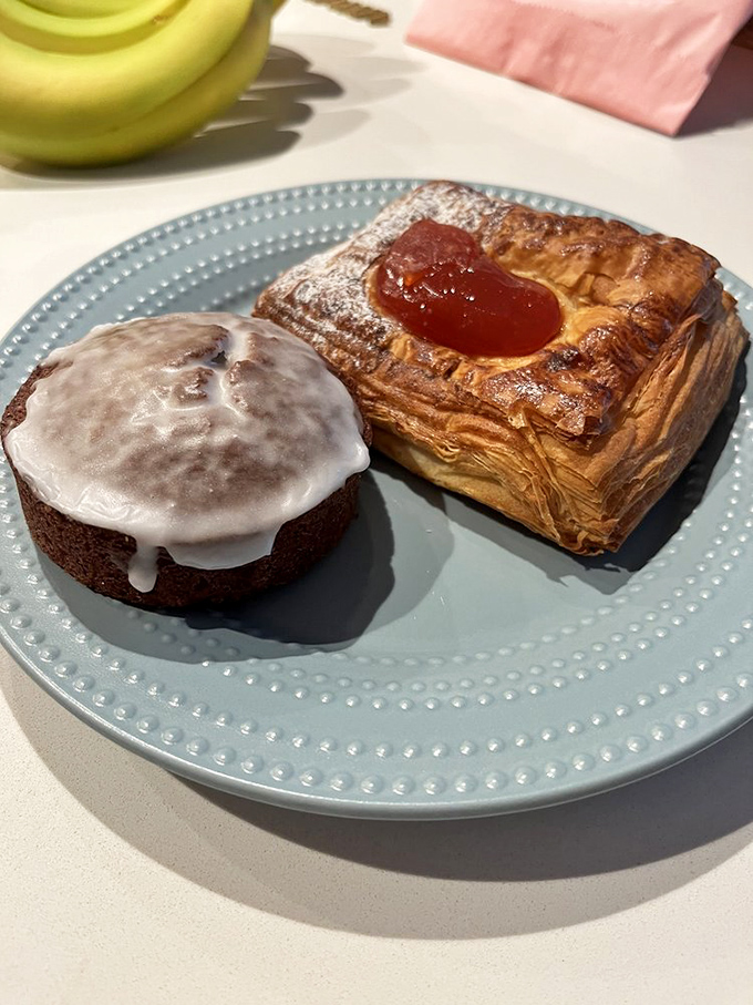 Pastry perfection doesn't need to shout. These handcrafted treats—a glazed Danish and iced cookie—demonstrate the quiet confidence of bakers who know exactly what they're doing.
