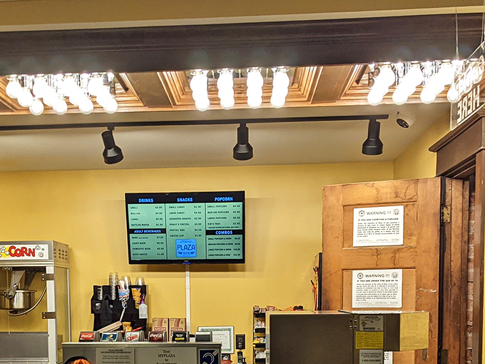 No mysterious "butter-flavored topping" here—The Plaza serves honest-to-goodness movie snacks at prices that won't make your wallet weep silently in the darkness.
