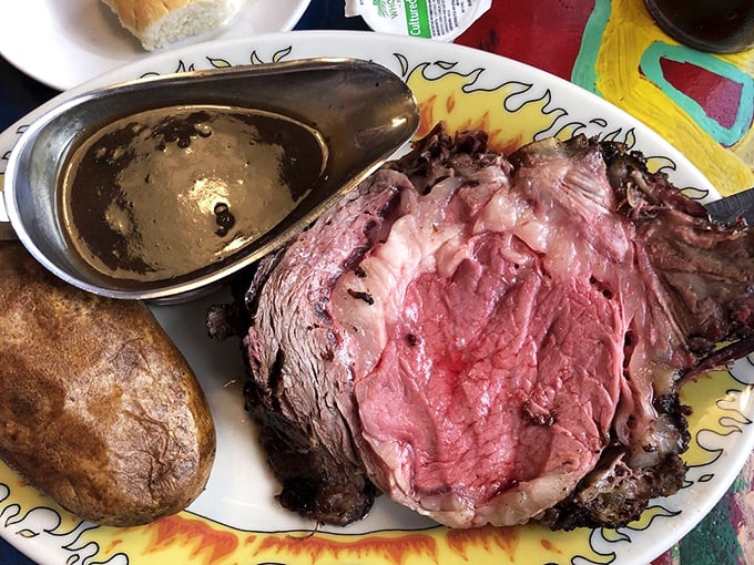 The prime rib doesn't just arrive, it makes an entrance – a perfectly pink interior surrounded by a seasoned crust that whispers, "I've been waiting for you."