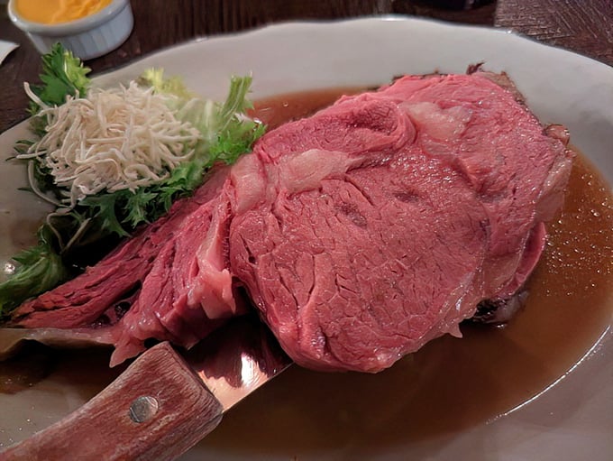 This prime rib isn't just dinner—it's a masterclass in patience. That rosy interior and rich au jus speak of slow-roasting perfection worth driving across Virginia for.