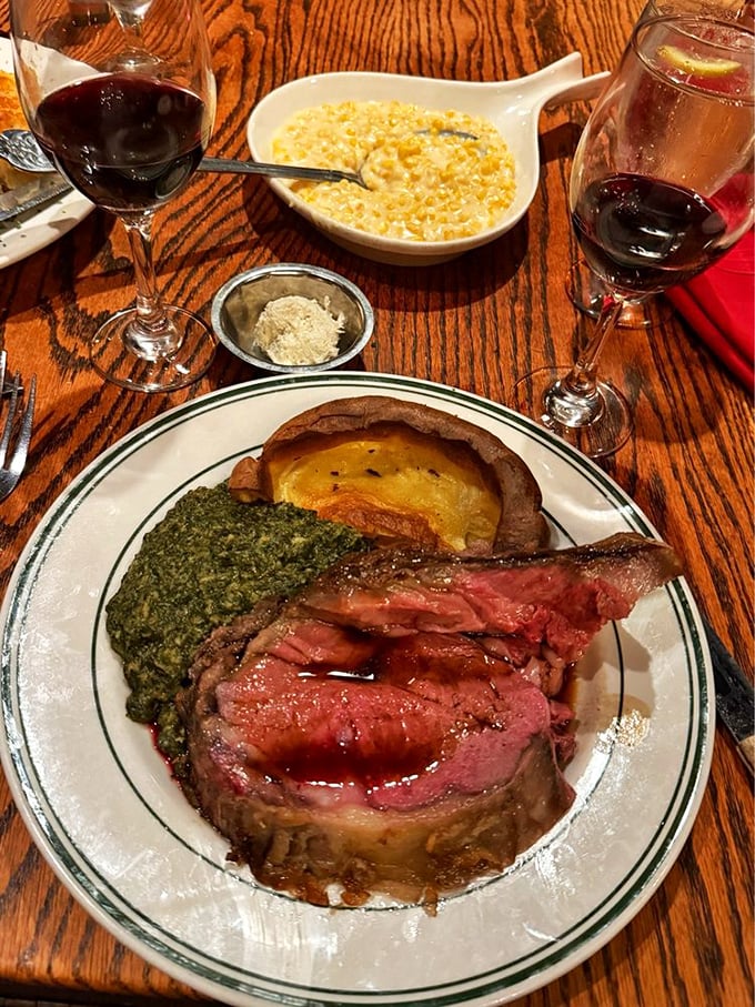 Prime rib so perfectly pink it could make a vegetarian question their life choices, served with Yorkshire pudding that's practically begging for a au jus bath.
