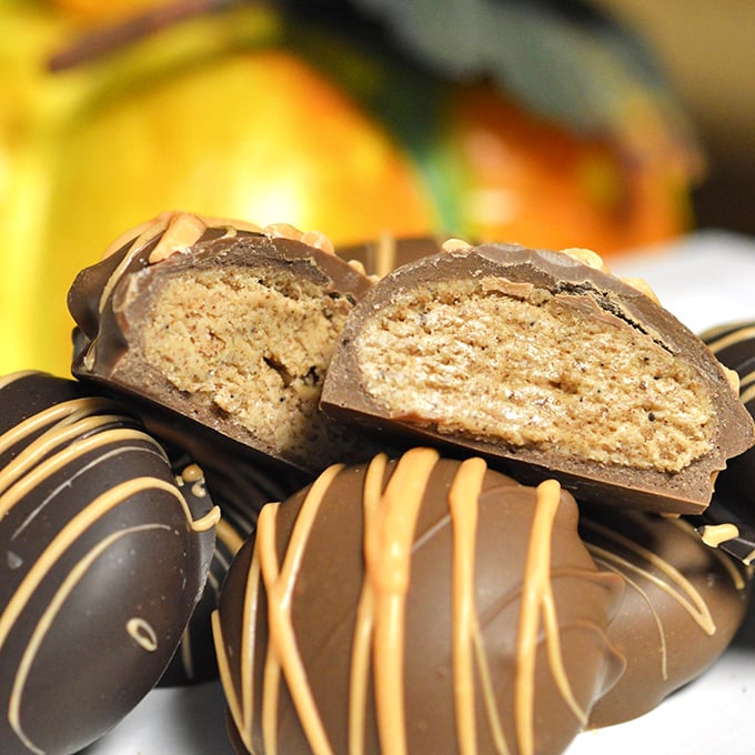 Cut one open and behold the magic! These pumpkin spice truffles reveal their creamy souls, proving that what's inside counts just as much as the glossy exterior.