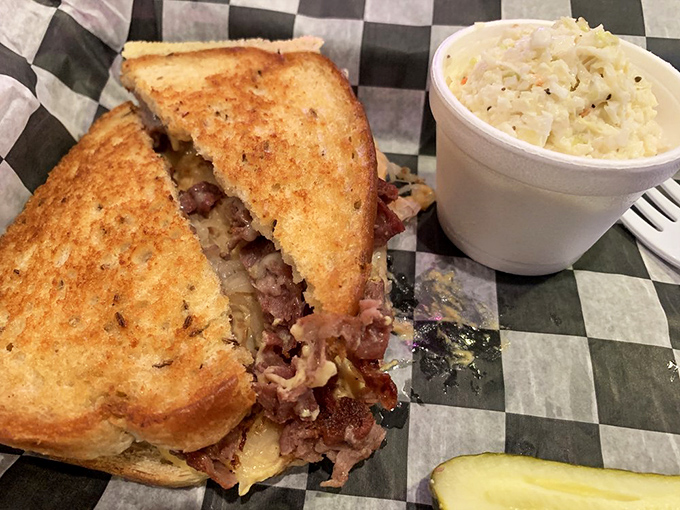 That moment when your Reuben arrives and you realize this isn't just lunch—it's an event. The creamy slaw stands by, ready for its supporting role.