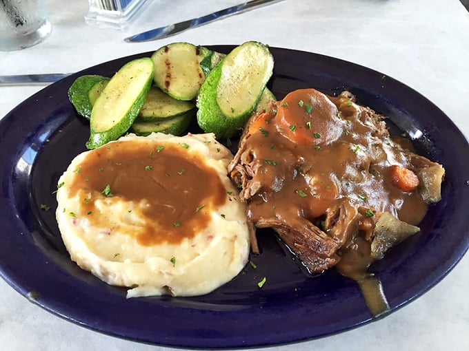 Pot roast that doesn't just fall apart—it surrenders completely. Those mashed potatoes aren't just a side dish; they're the perfect canvas for that rich, savory gravy.