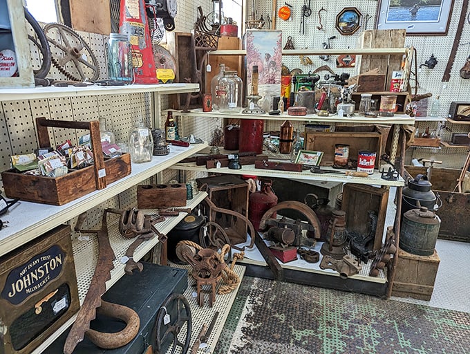 Rusty farm implements and weathered wooden boxes – each with more character than most modern furniture catalogs combined.